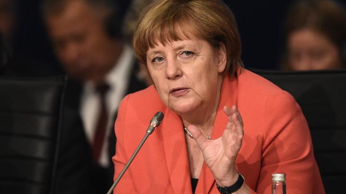 Merkel: Ben de masayı devirebilirim, dönünce kahraman olurum - Dünya ...