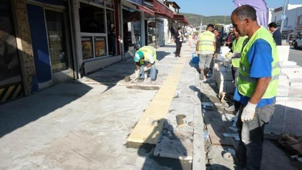 Bodrum'da iki cadde yol ve kaldırım, bir sokakta ise menfez çalışması ...